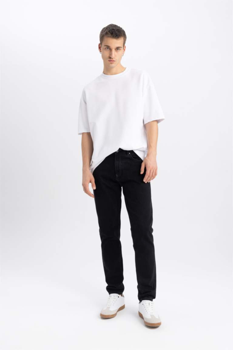 Black MAN Regular Tapered Fit Trousers 2996970 | DeFacto
