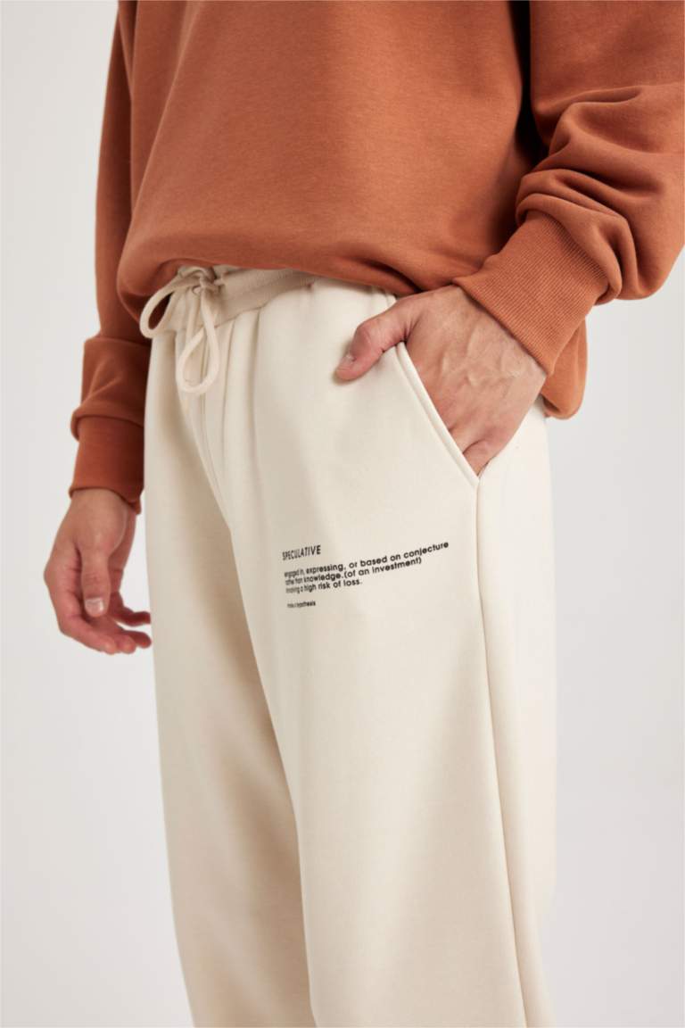 Beige MAN Regular Fit Regular Hem With Pockets Sweatpants 2839234 | DeFacto